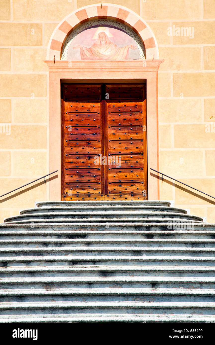 sunny day italy church tradate varese the old door entrance and mosaic ...