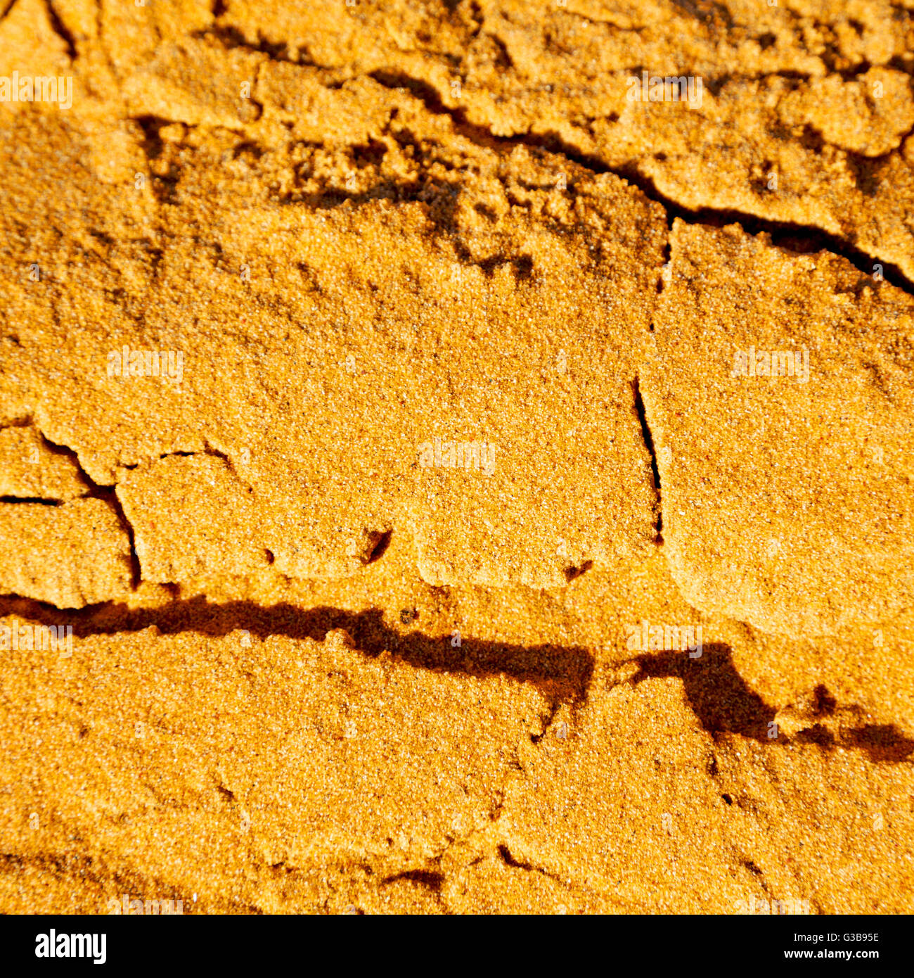 old desert and the abstract cracked sand texture in oman rub al khali ...
