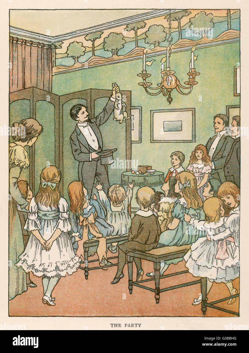 Conjuror performs magic trick at a child's party Stock Photo - Alamy