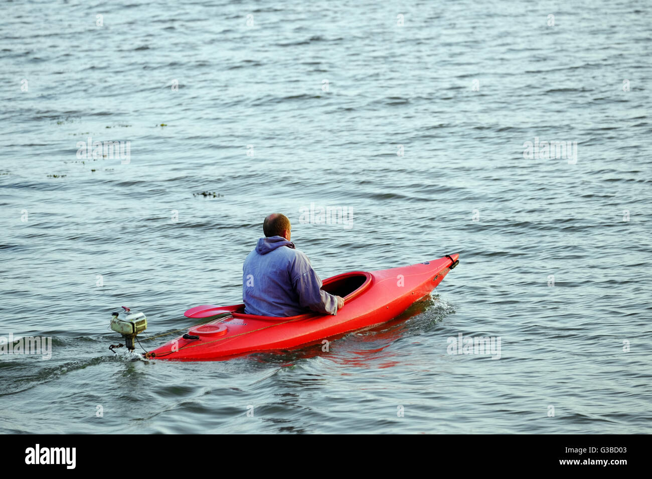 A motorised canoe, crossing the River Exe Stock Photo - Alamy