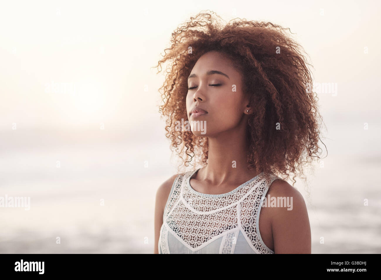Deep relaxation at the beach Stock Photo - Alamy