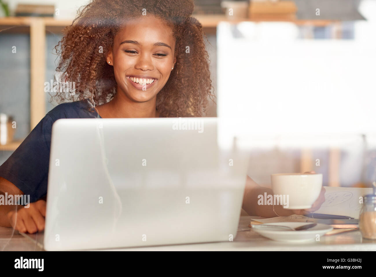 Enjoying wifi at the cafe Stock Photo - Alamy
