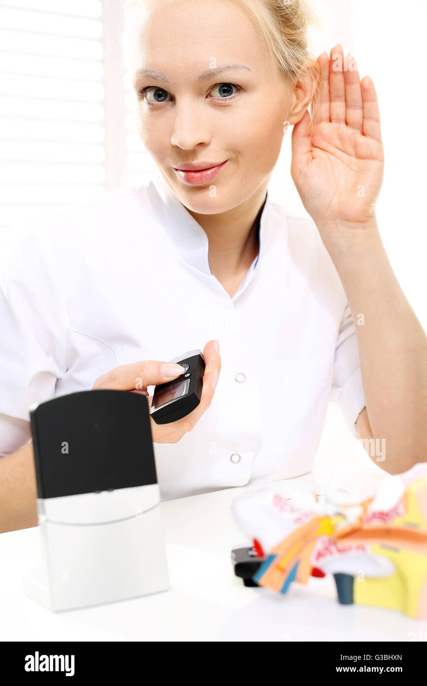 Woman listen to sound. Recovery of hearing Stock Photo - Alamy