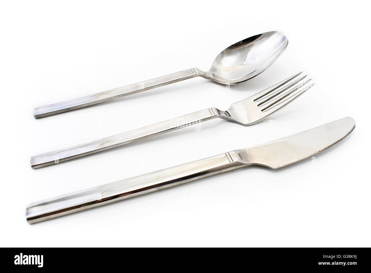 Cutlery set with Fork, Knife and Spoon isolated on white Stock Photo ...