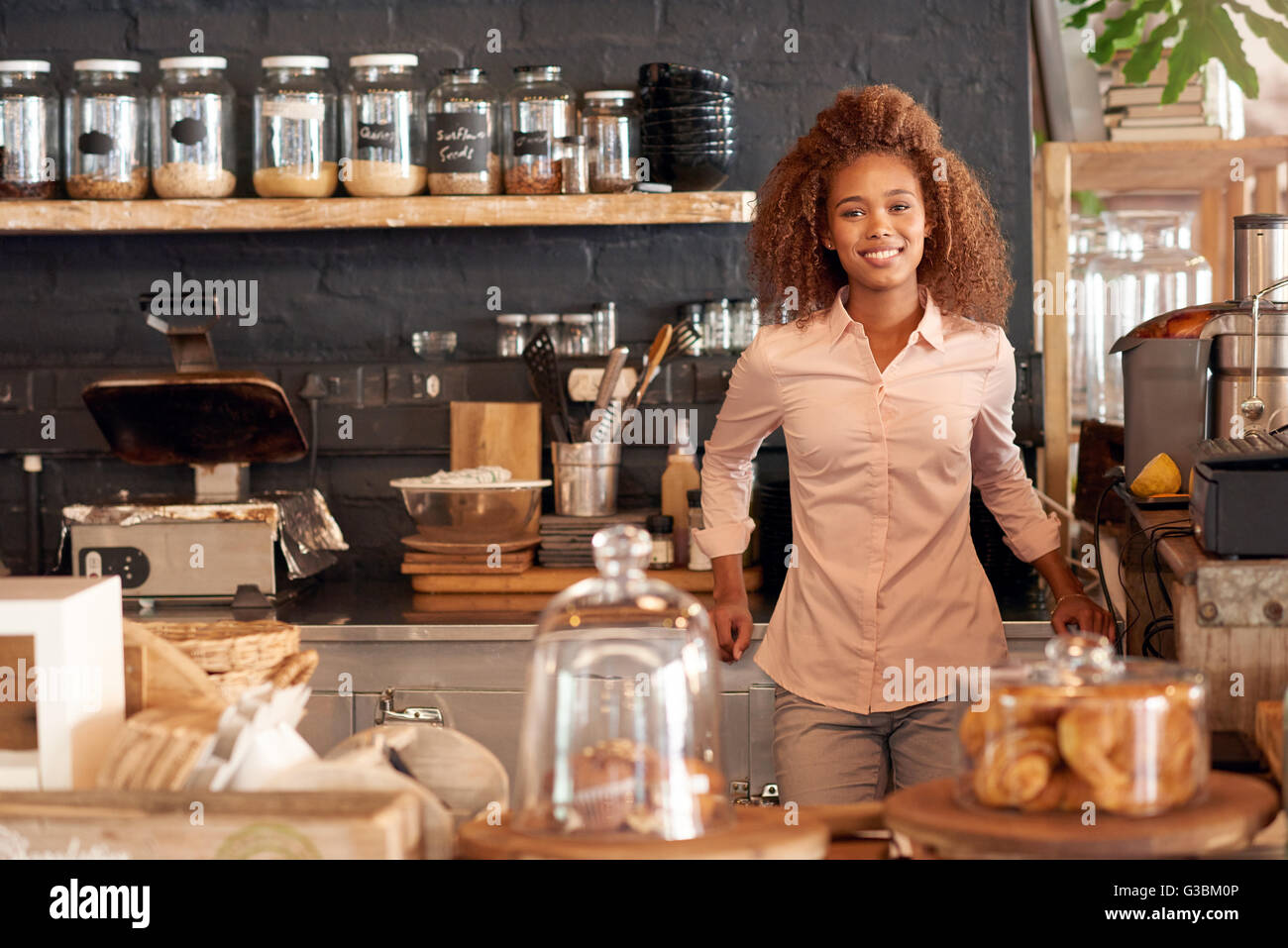 Service and hospitality with a smile Stock Photo - Alamy