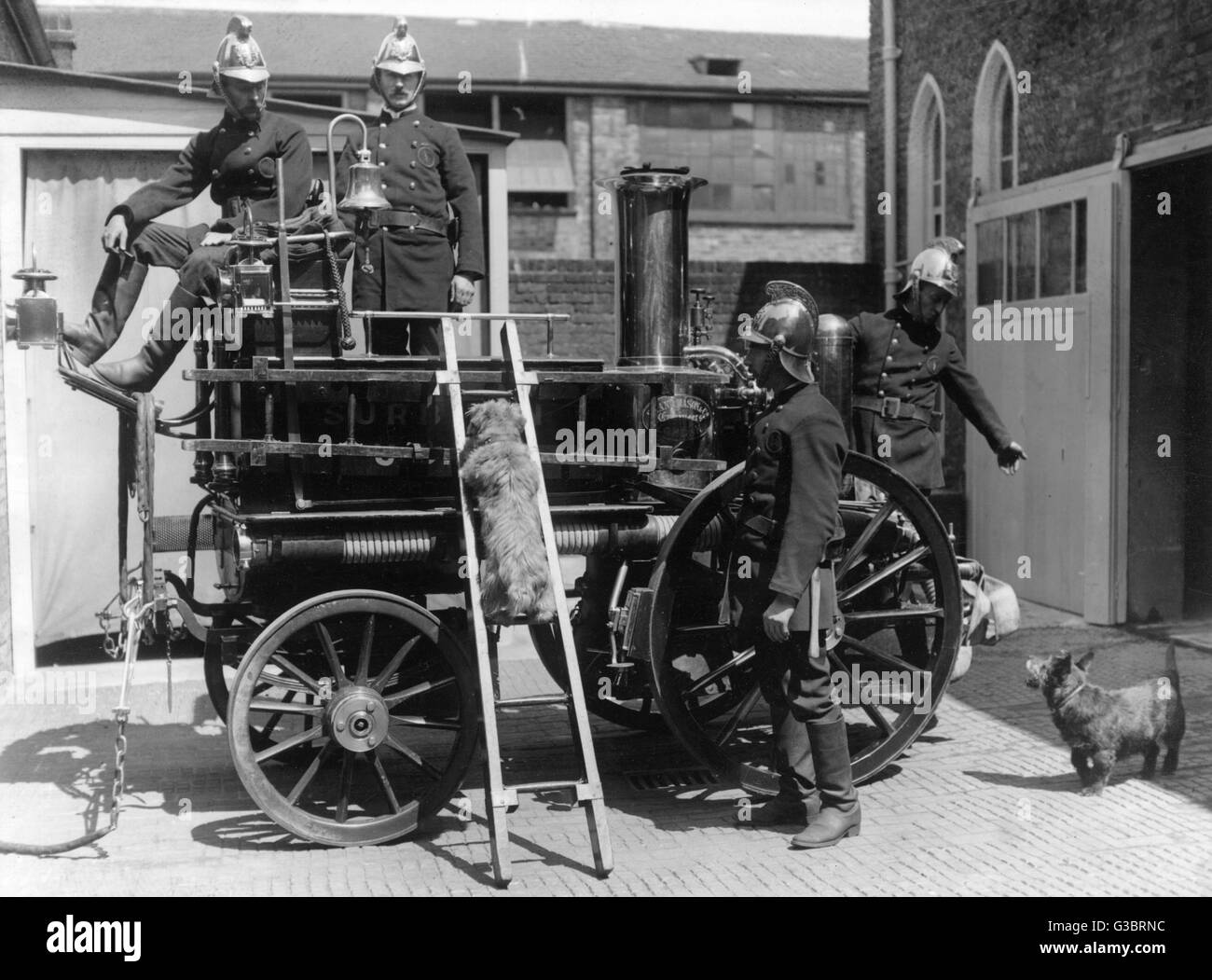 Old style firemen hi-res stock photography and images - Alamy