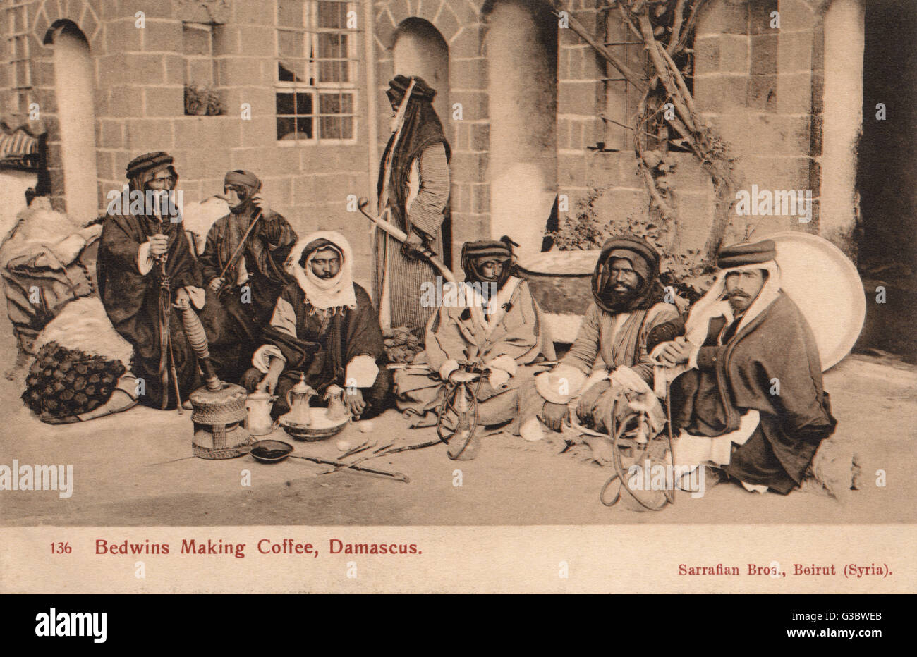 Damascus, Syria - Bedouin men making (and drinking) coffee Stock Photo ...