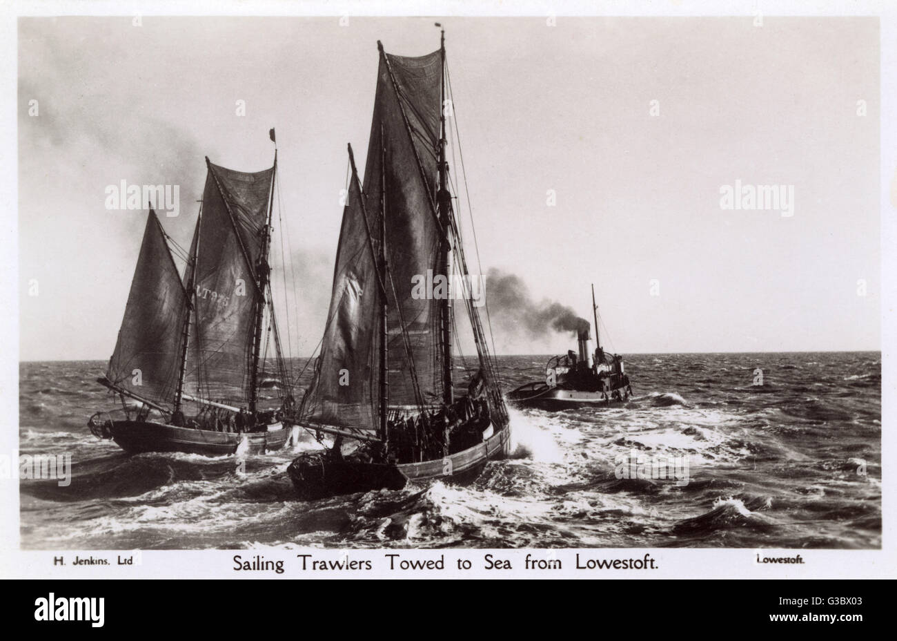 Lowestoft, Suffolk - Sailing trawlers towed to Sea Stock Photo - Alamy
