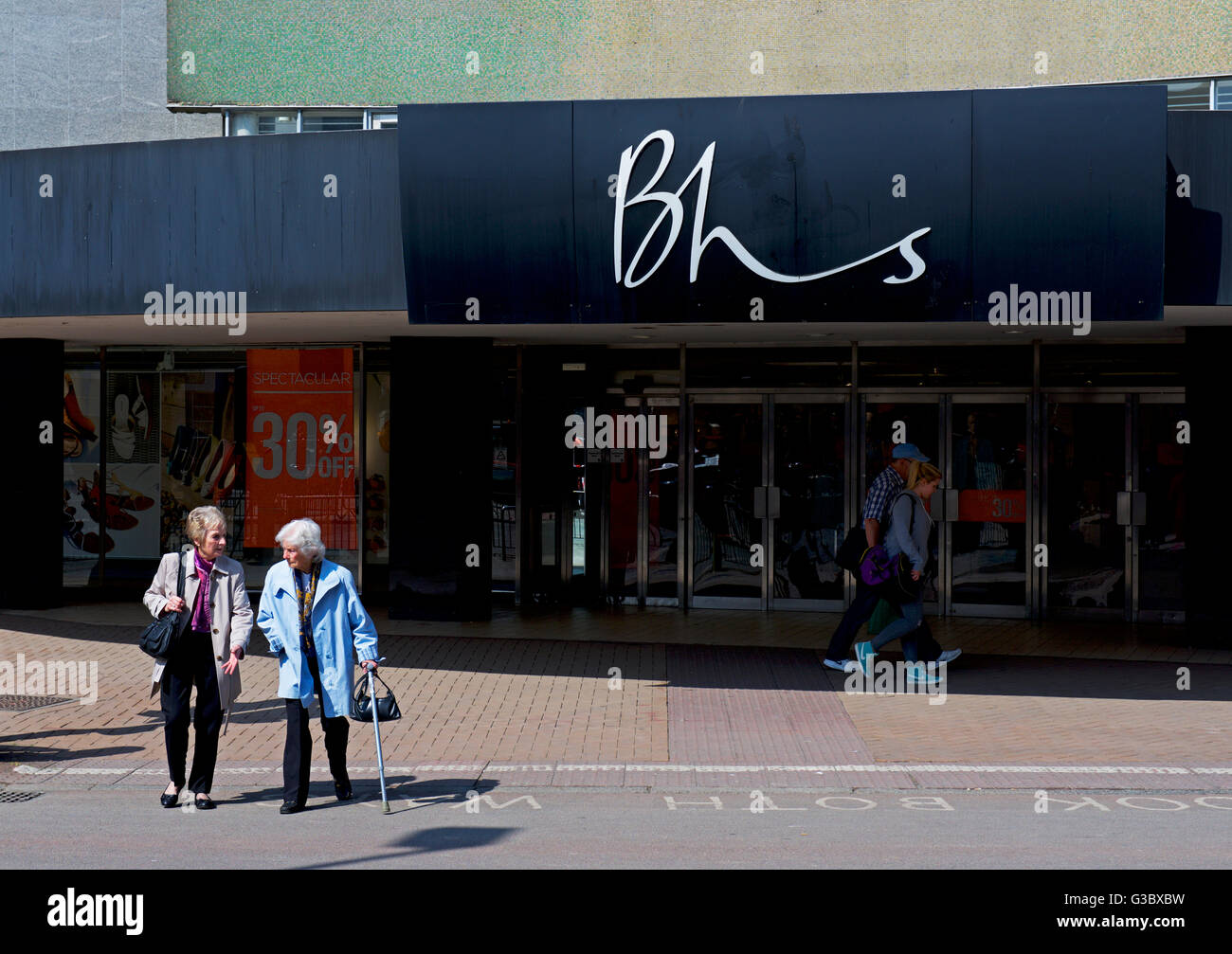 Two middle-aged woman and branch of BHS department store, Kingston upon ...