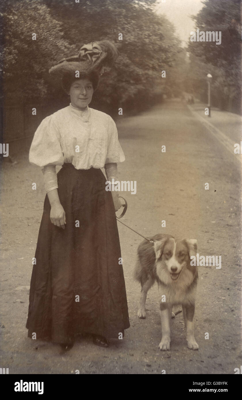 Lady with her dog at the park hi-res stock photography and images - Alamy
