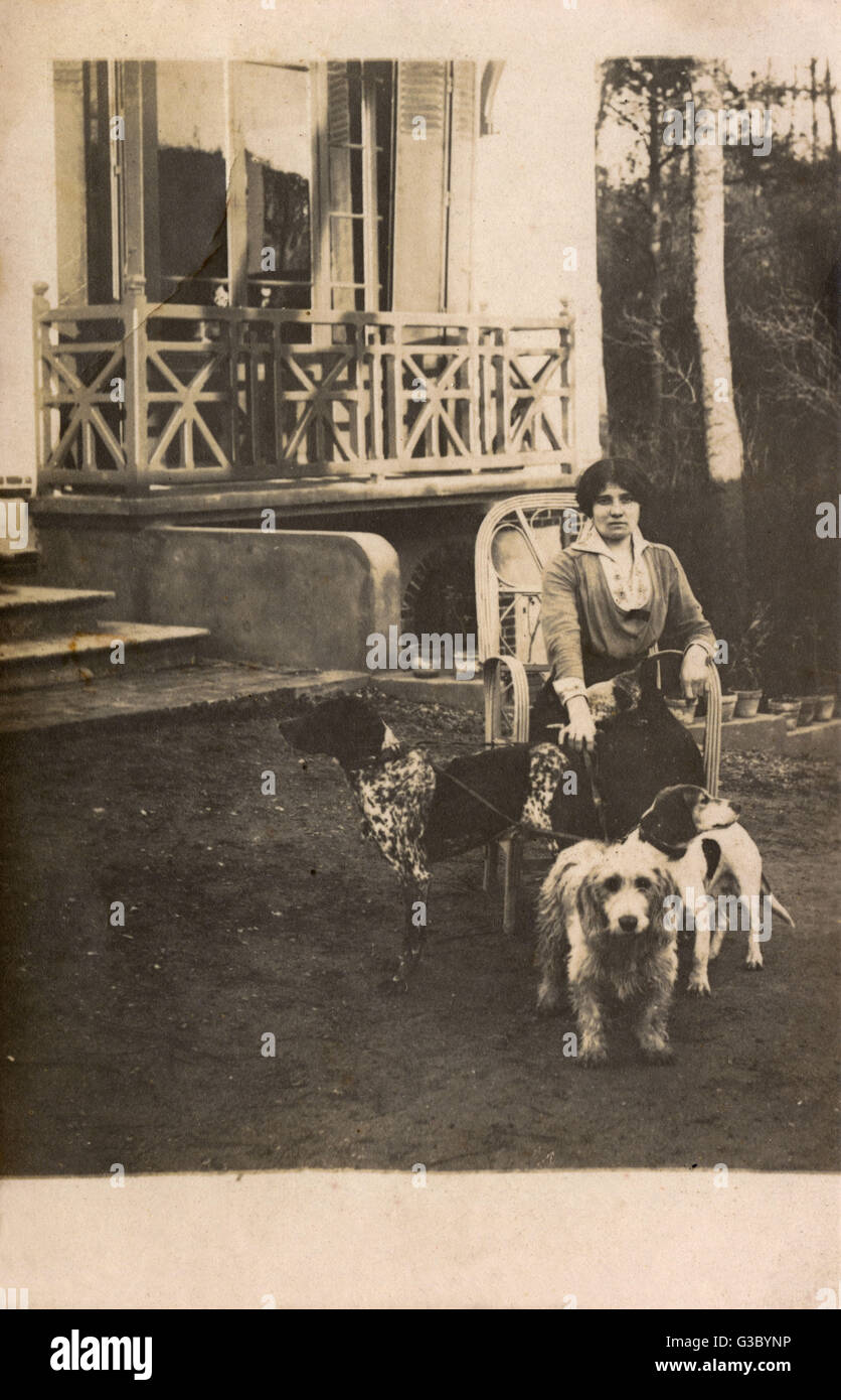 Woman with three dogs hi-res stock photography and images - Alamy