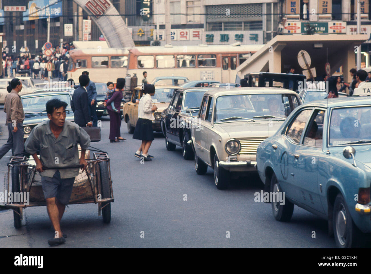 Busy day in Sogong Street, Seoul, South Korea, with the Chosun Hotel in ...