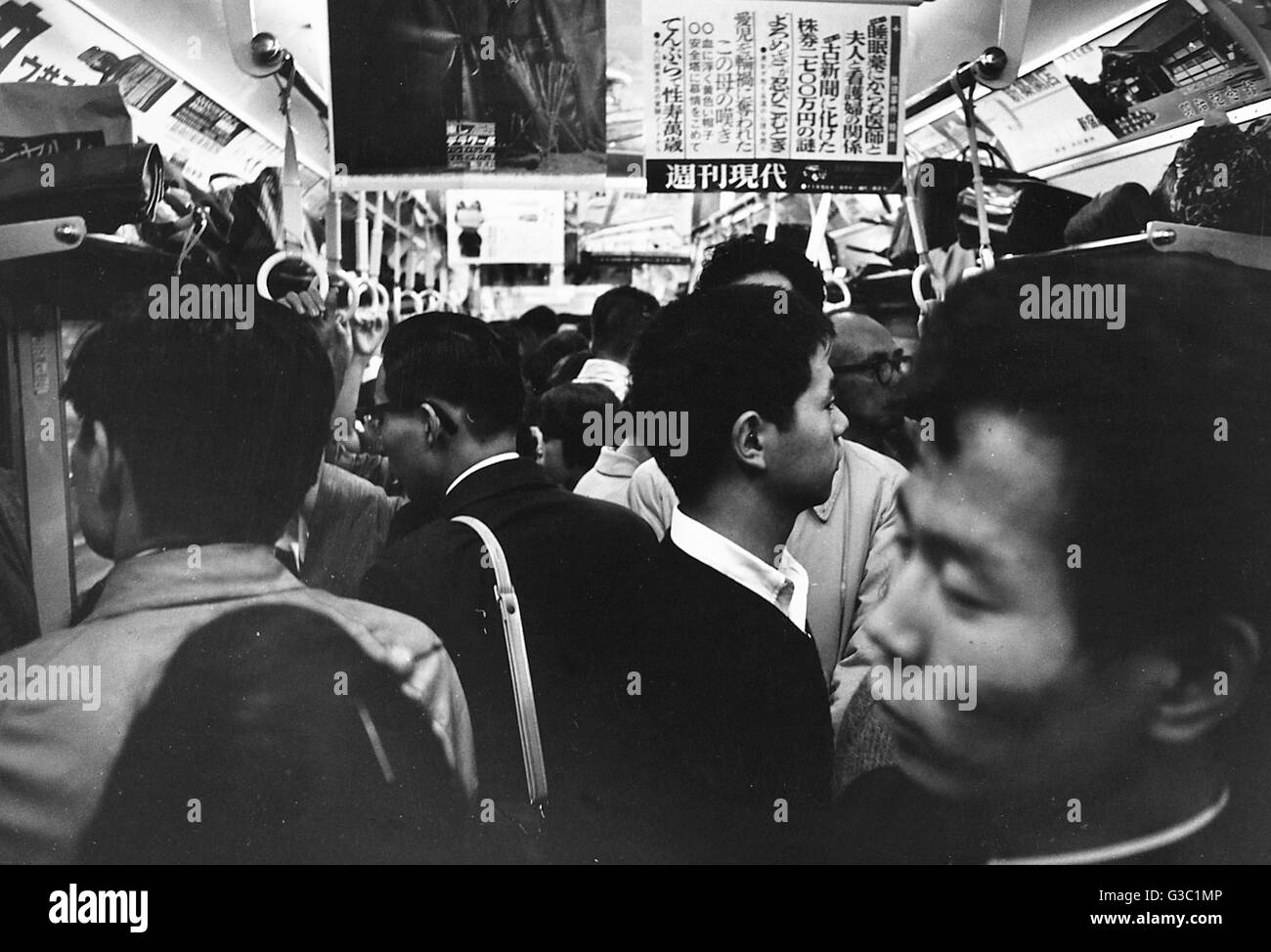 Packed tokyo train Black and White Stock Photos & Images - Alamy