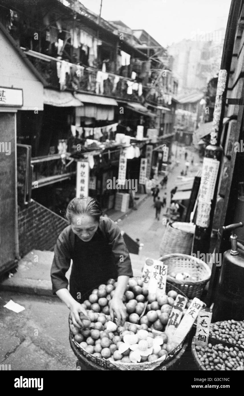Woman in street 1960s hi-res stock photography and images - Alamy
