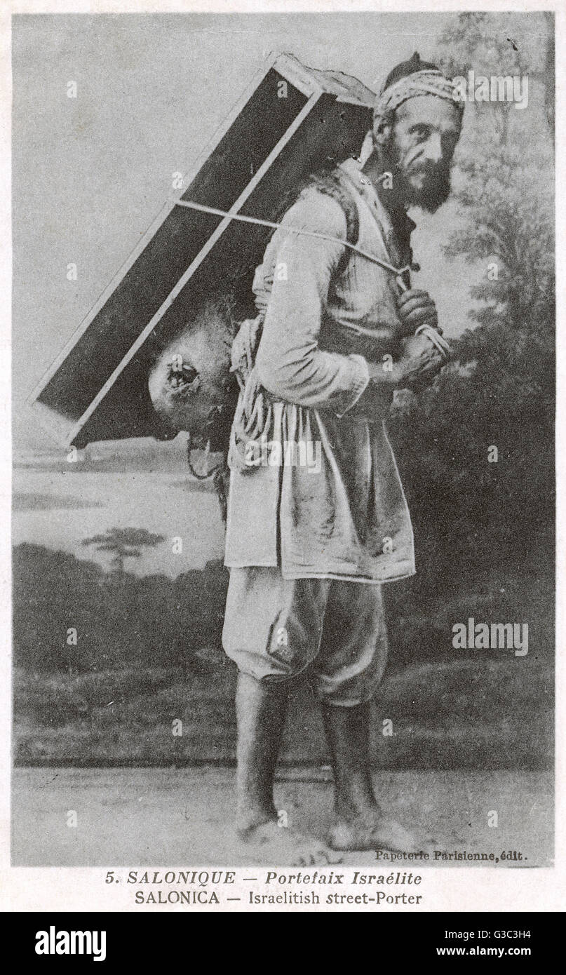 Thessaloniki, Greece - Jewish Porter carrying a pallet Stock Photo - Alamy
