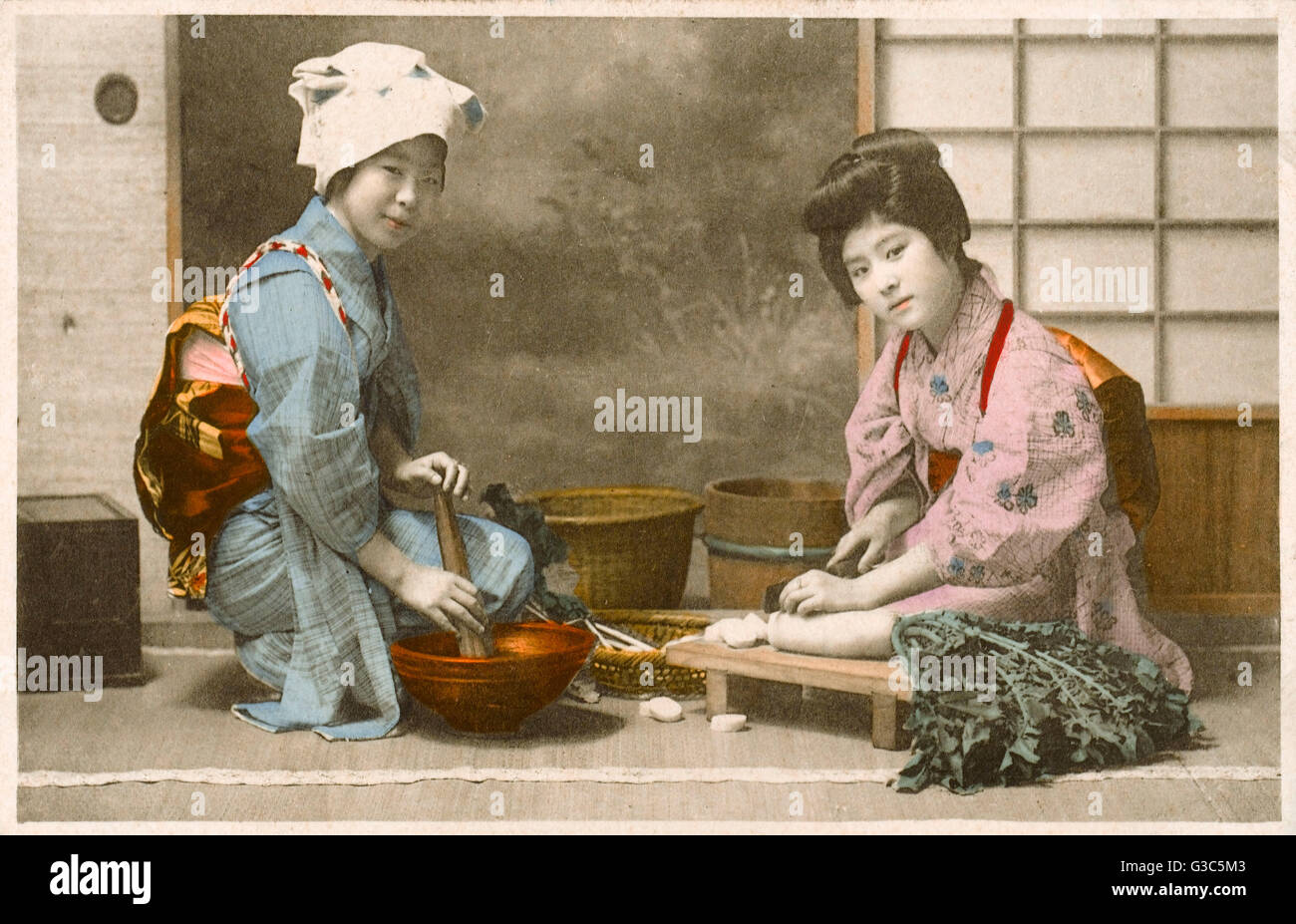 Japan - Women preparing food including chopping a daikon Stock Photo ...