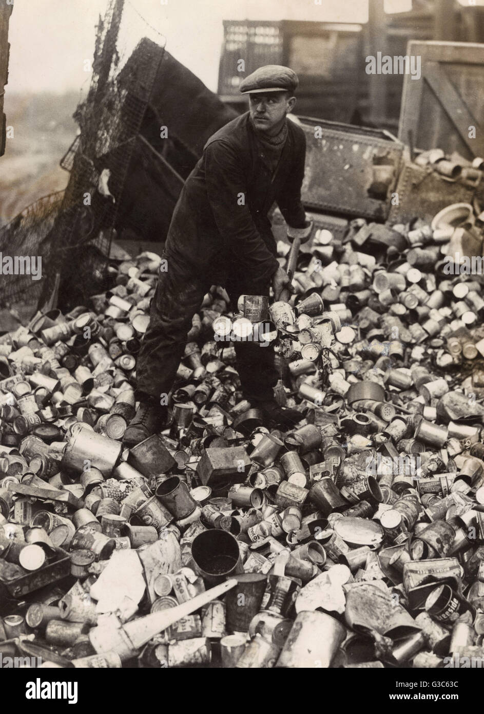 WW2 - Recycling cans to aid war effort in East Ham, London Stock Photo ...