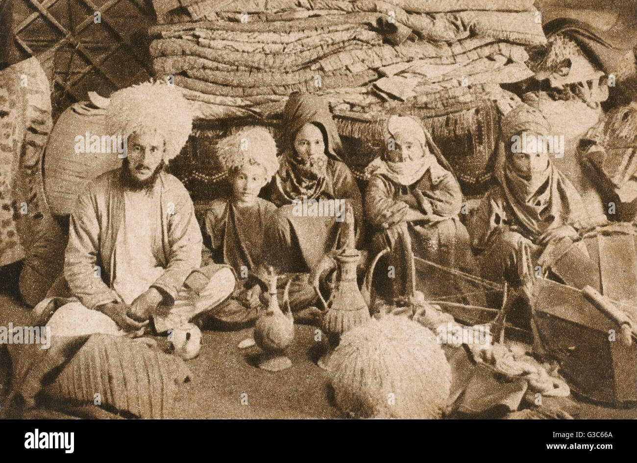 A Nomadic family group from Turkmenistan - inside their yurt Stock ...