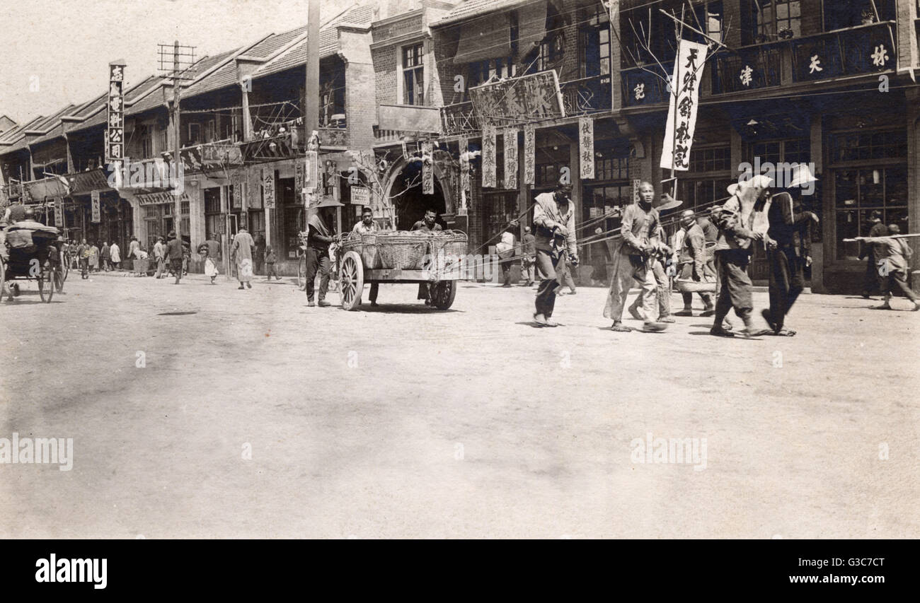 China labourer pull cart rocks street hi-res stock photography and ...