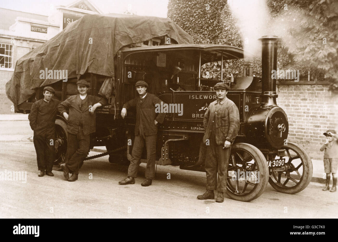 Four delivery men with a Foden steam lorry, owned by the Isleworth ...