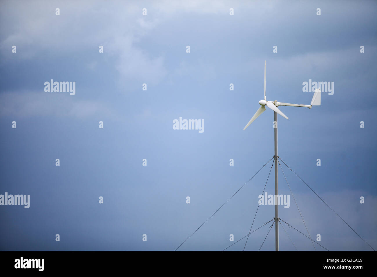 Color image of a wind vane on a cloudy day Stock Photo - Alamy