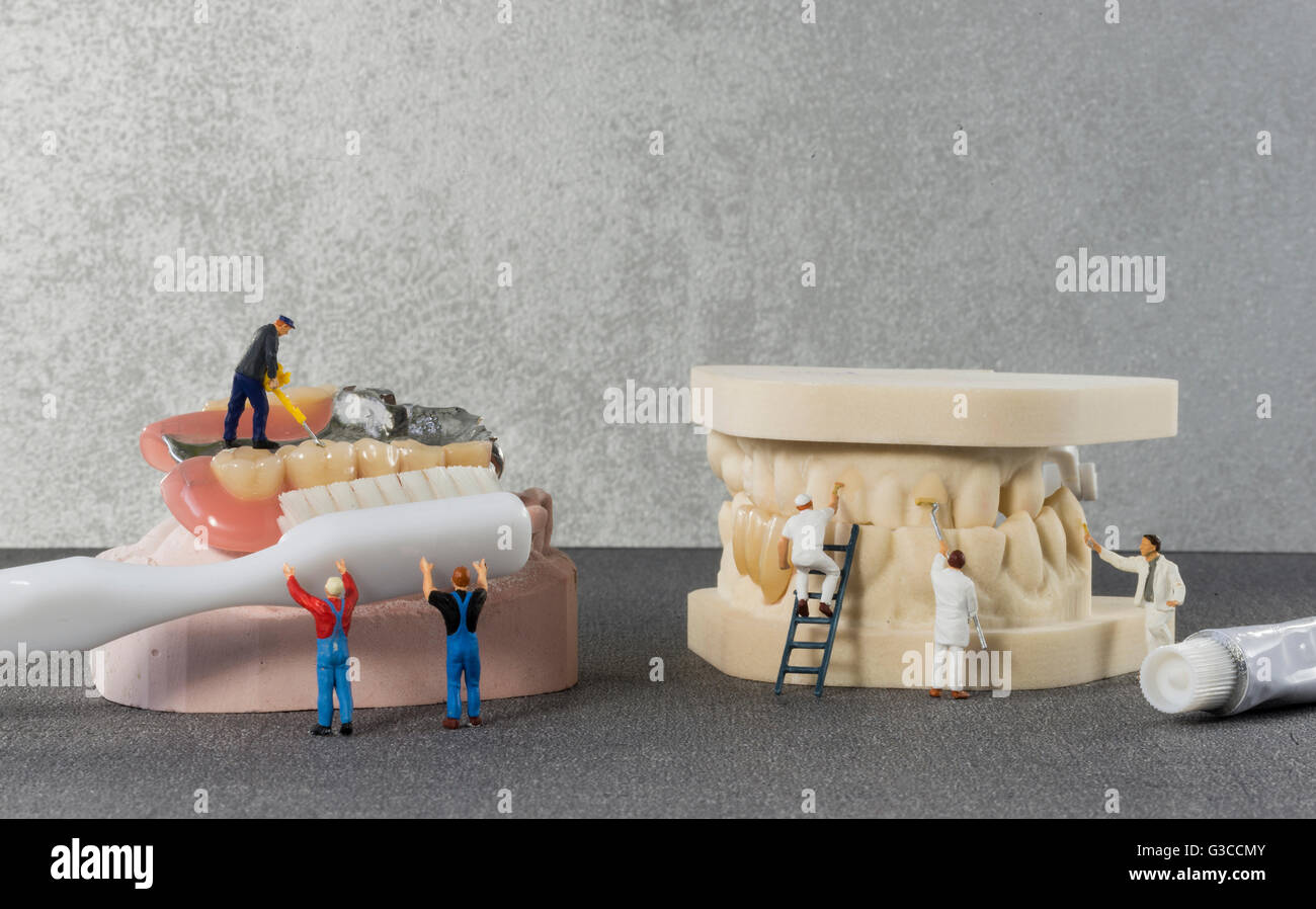 little people brushing teeth Stock Photo - Alamy