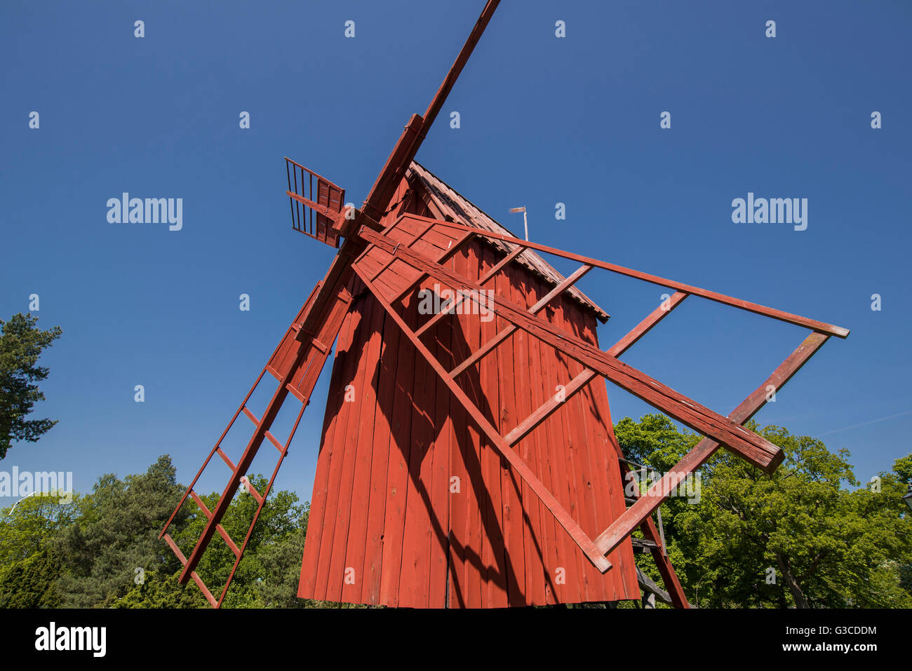 A red windmill in Skansen, Sweden Stock Photo - Alamy
