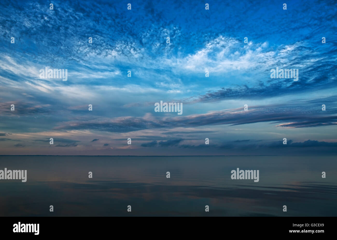 Blue sea, sky and clouds Stock Photo - Alamy