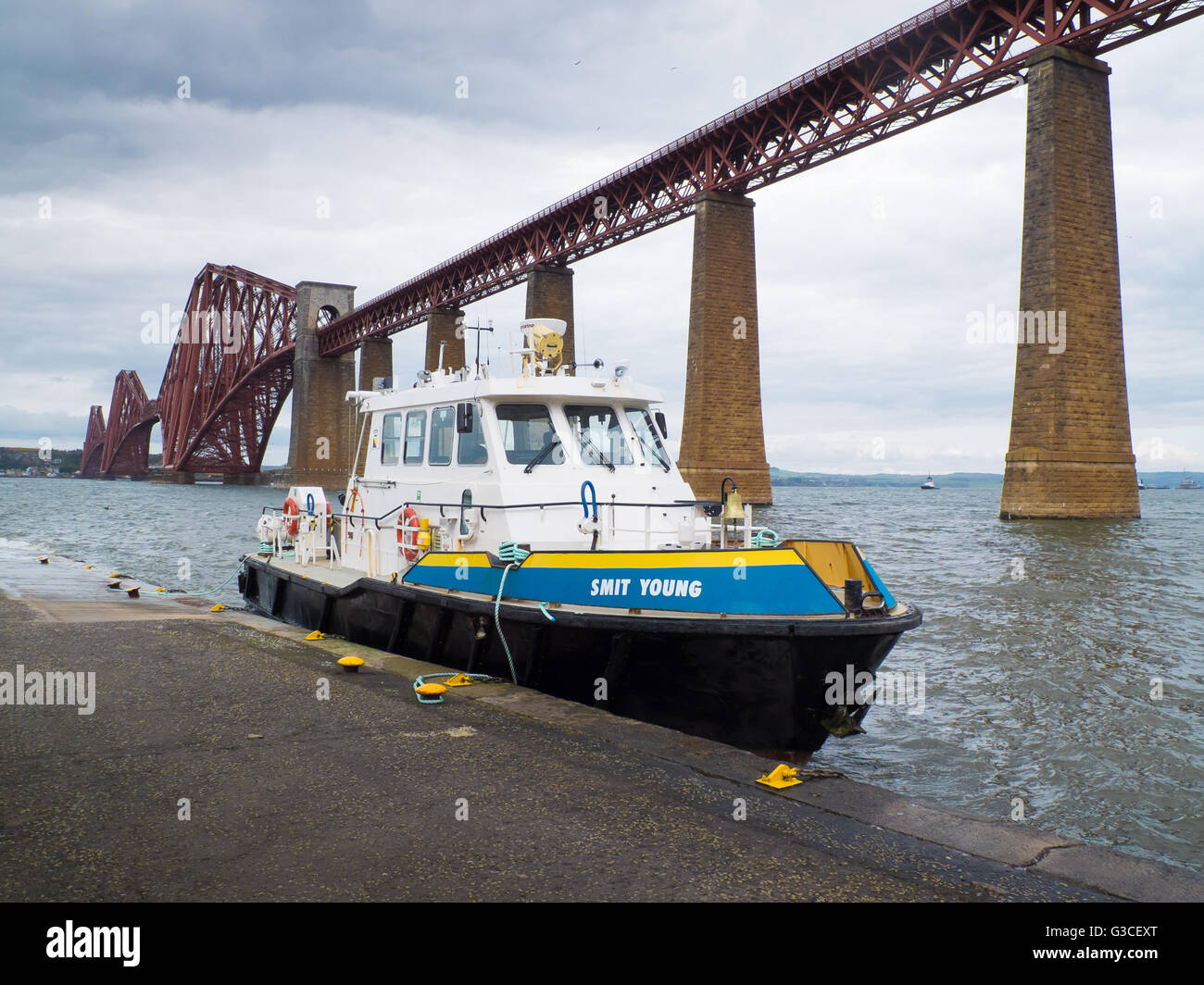 forth railway bridge and boat Stock Photo - Alamy