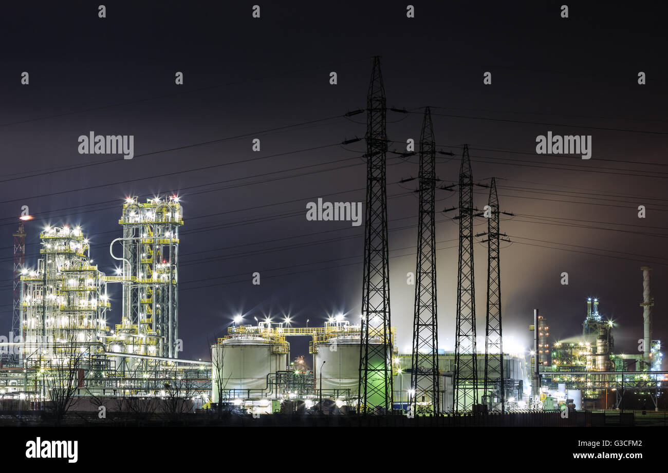 Oil refinery at night Stock Photo - Alamy