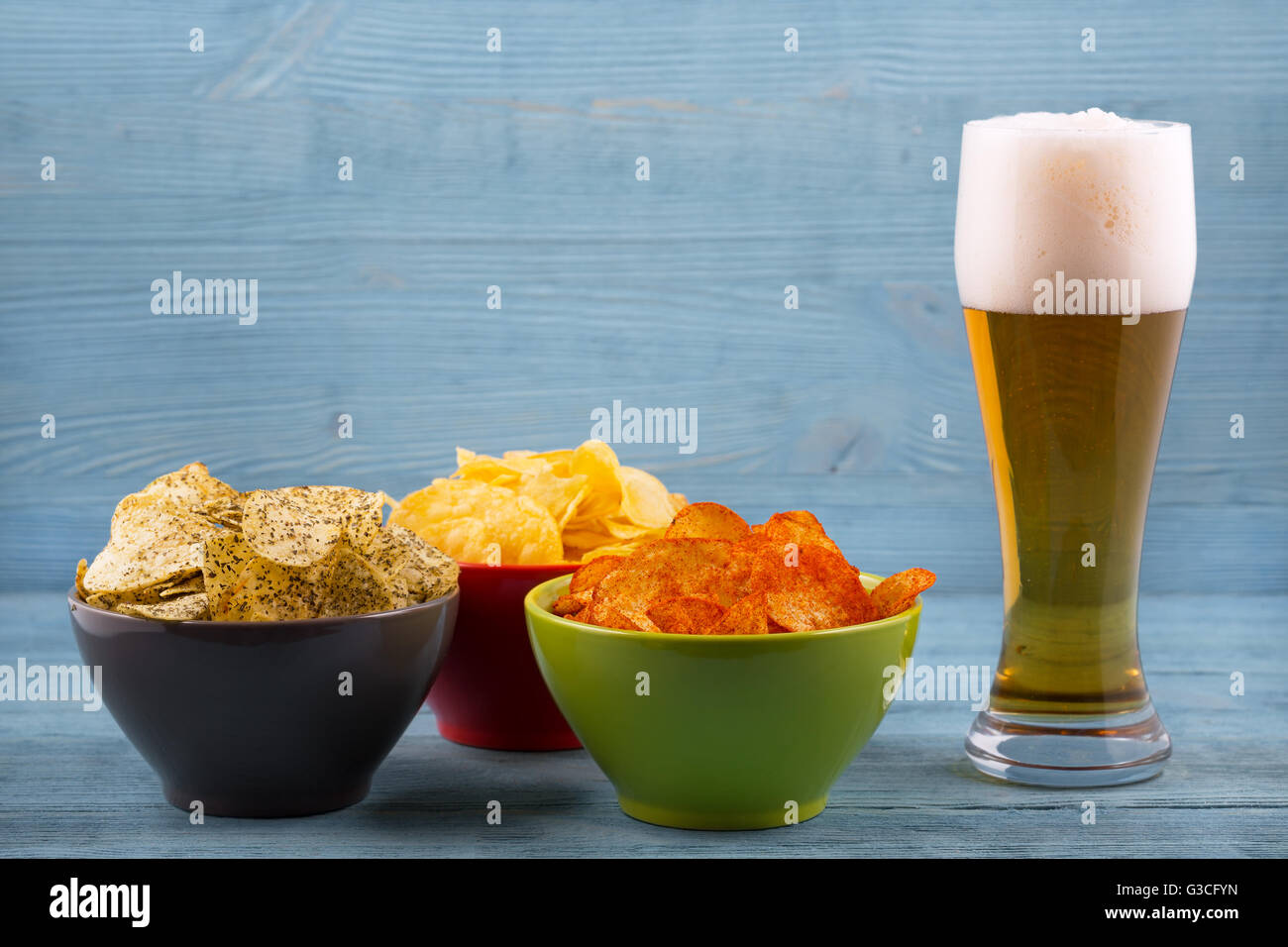 Beer and various types of chips Stock Photo - Alamy