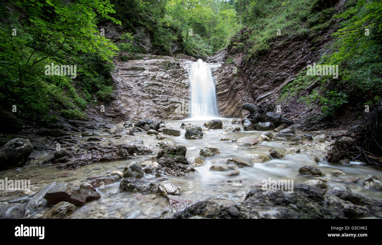 Small waterfall with rocks in the forest hi-res stock photography and ...