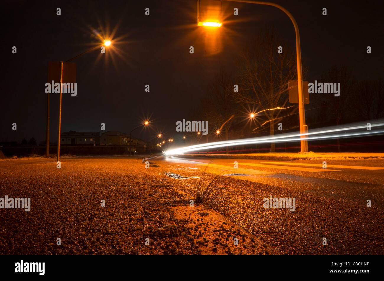 Long time exposure, street with lantern and car Stock Photo - Alamy