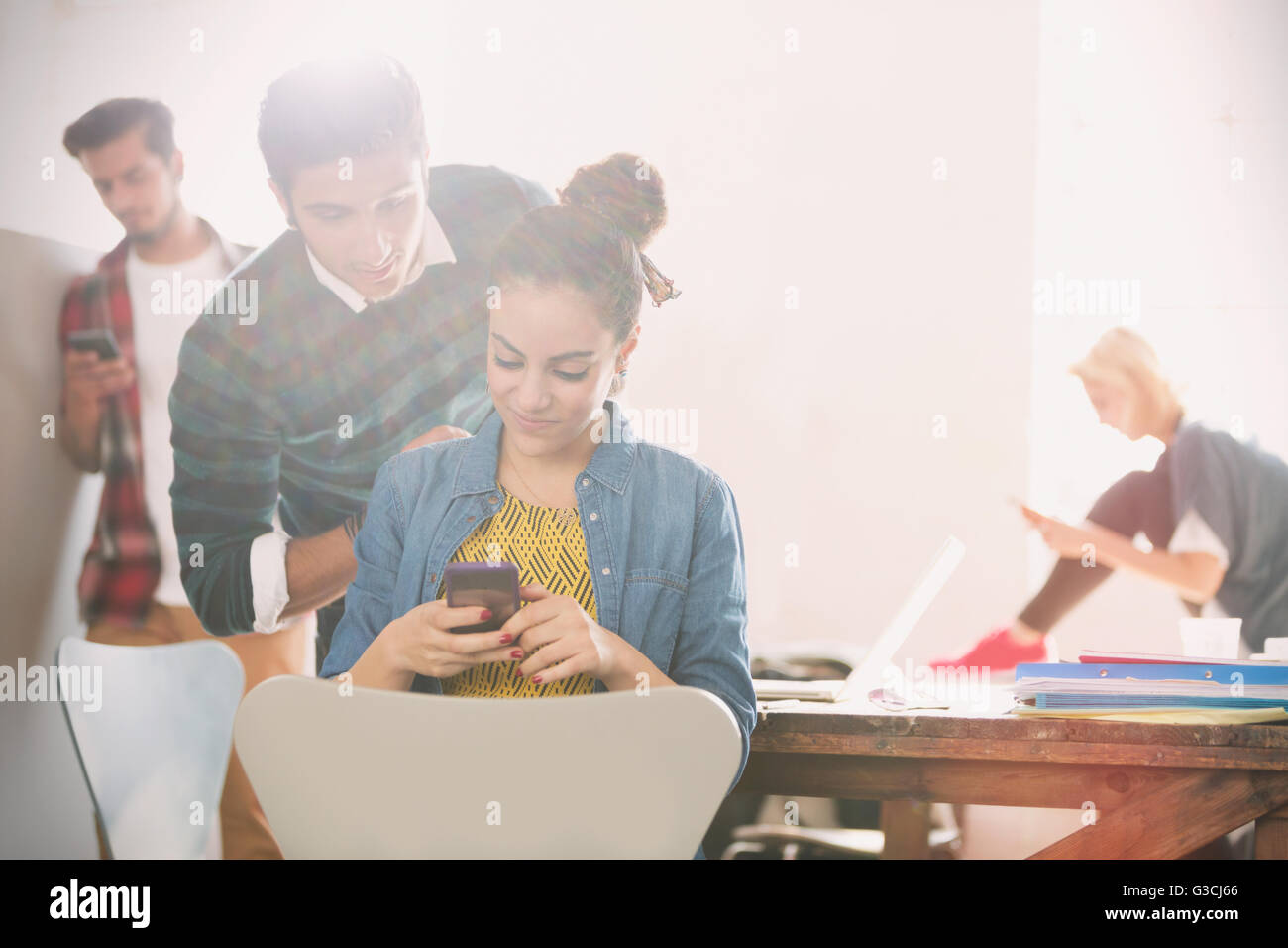 Office mobile phone texting hi-res stock photography and images - Alamy