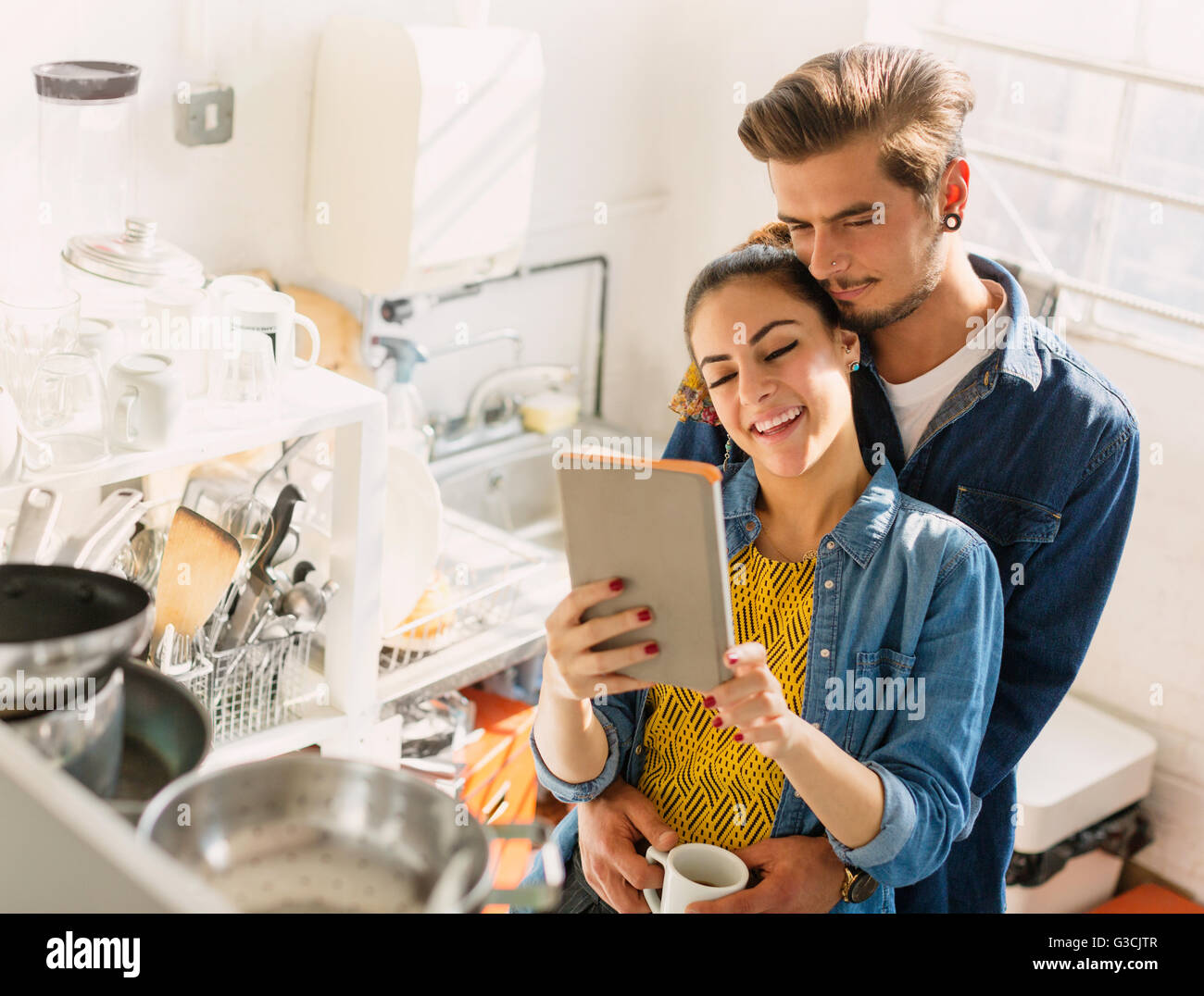 Two people showing around apartment hi-res stock photography and images ...
