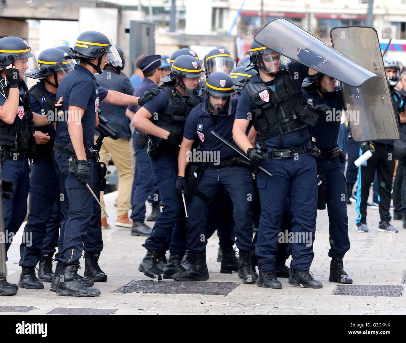 French police face English football fans at The Queen Victoria pub in ...