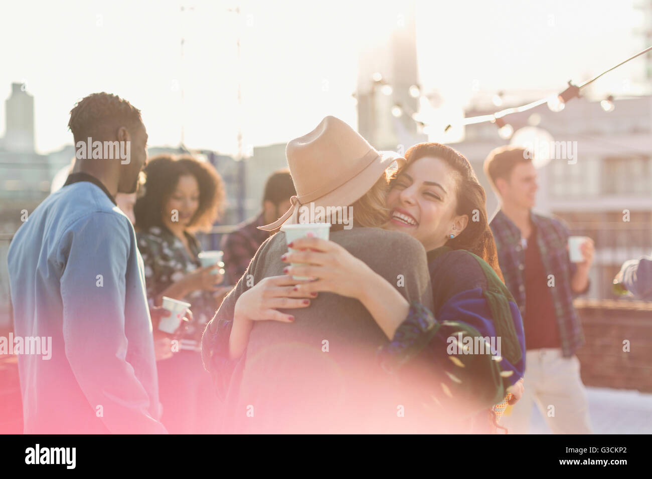 Hugging party hi-res stock photography and images - Alamy
