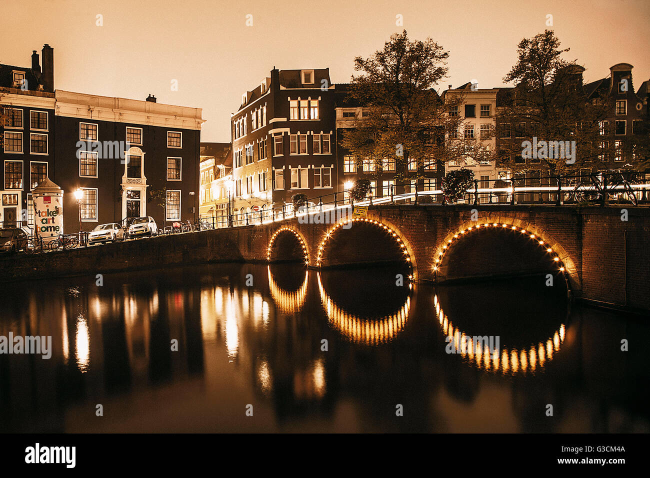 A bridge in Amsterdam by night Stock Photo - Alamy