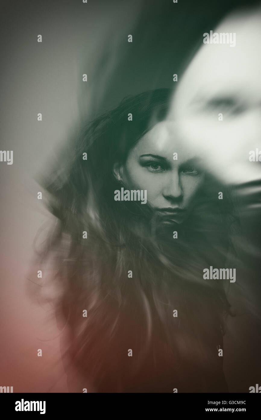 Young woman, studio shot Stock Photo - Alamy