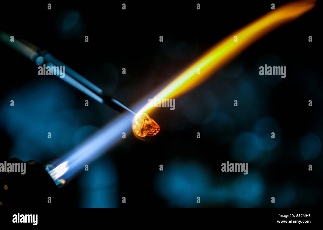 Fire ray on glass during glass production Stock Photo - Alamy