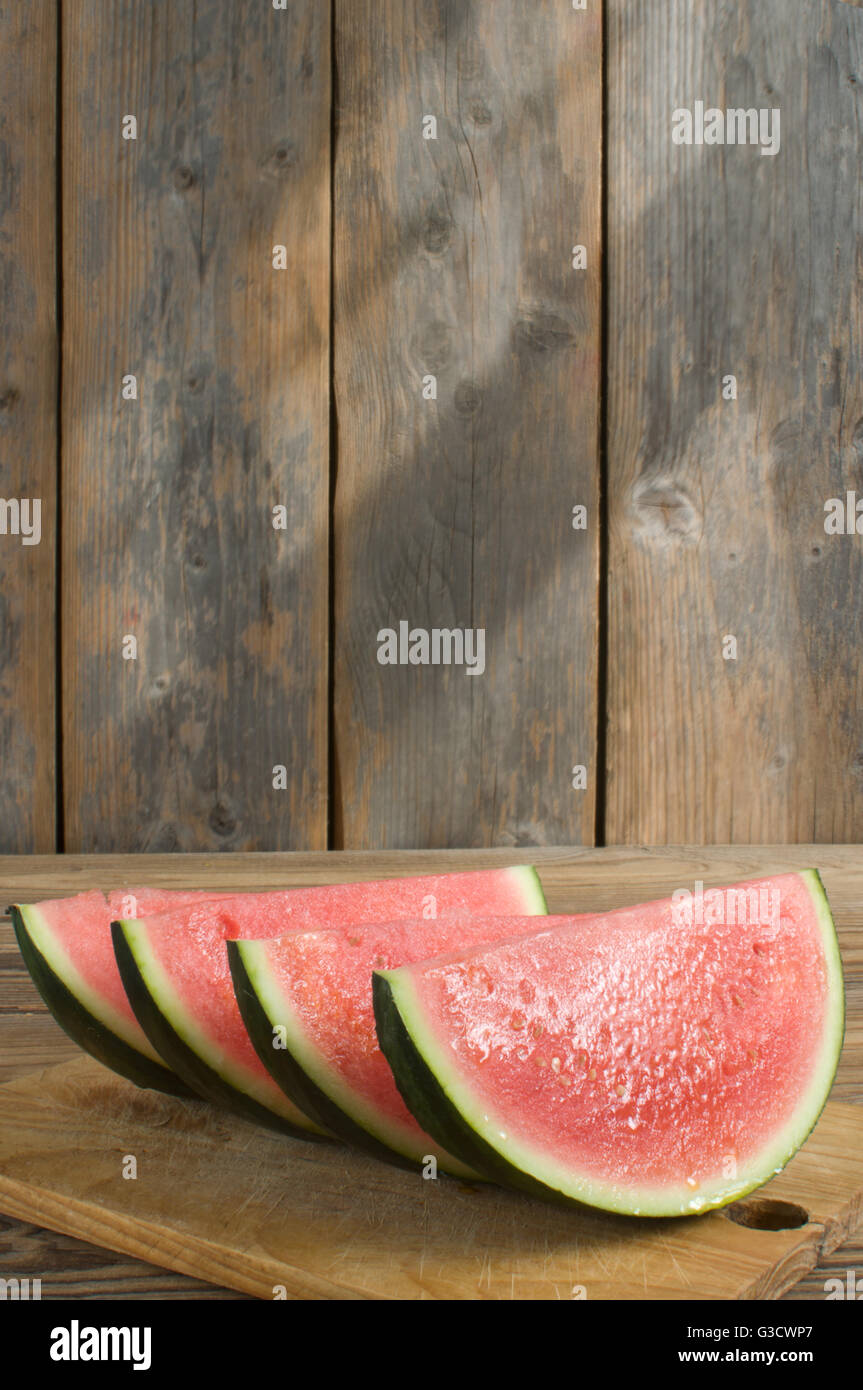 Watermelon slices on wooden hi-res stock photography and images - Alamy