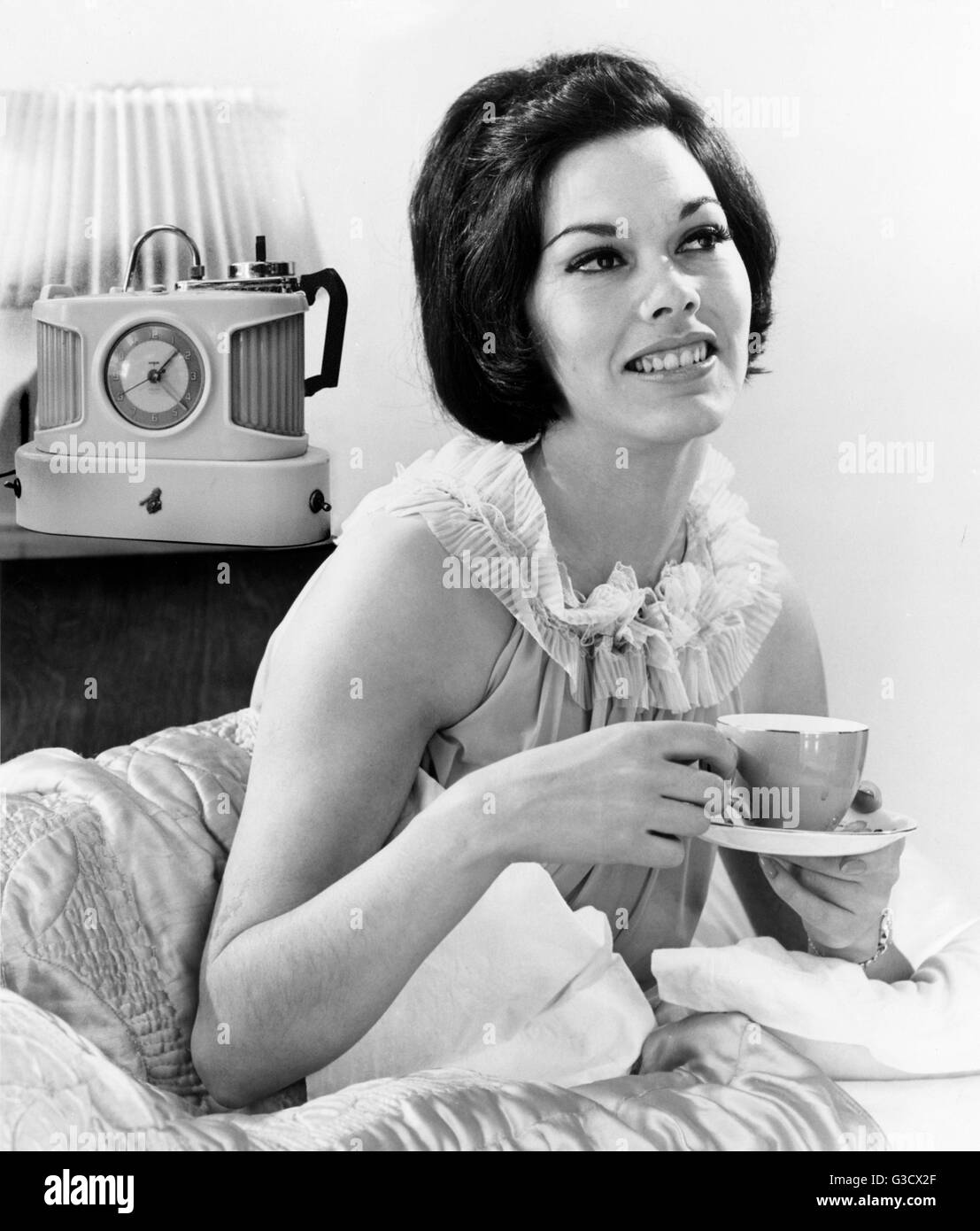A glamorous female model with her trusty Goblin Teasmade Stock Photo - Alamy