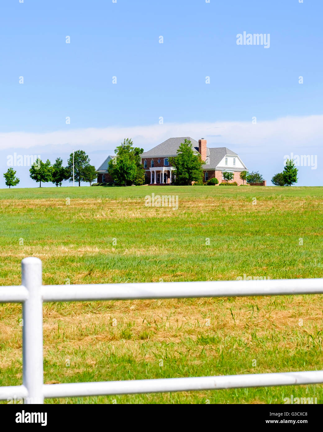 An upscale farm or ranch house in the countryside of Oklahoma, USA ...
