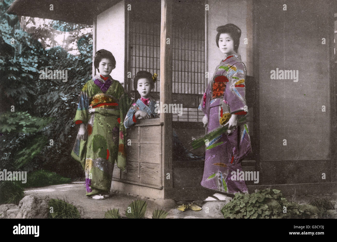 Japan - Three Geisha pose for the photographer by a house Stock Photo ...