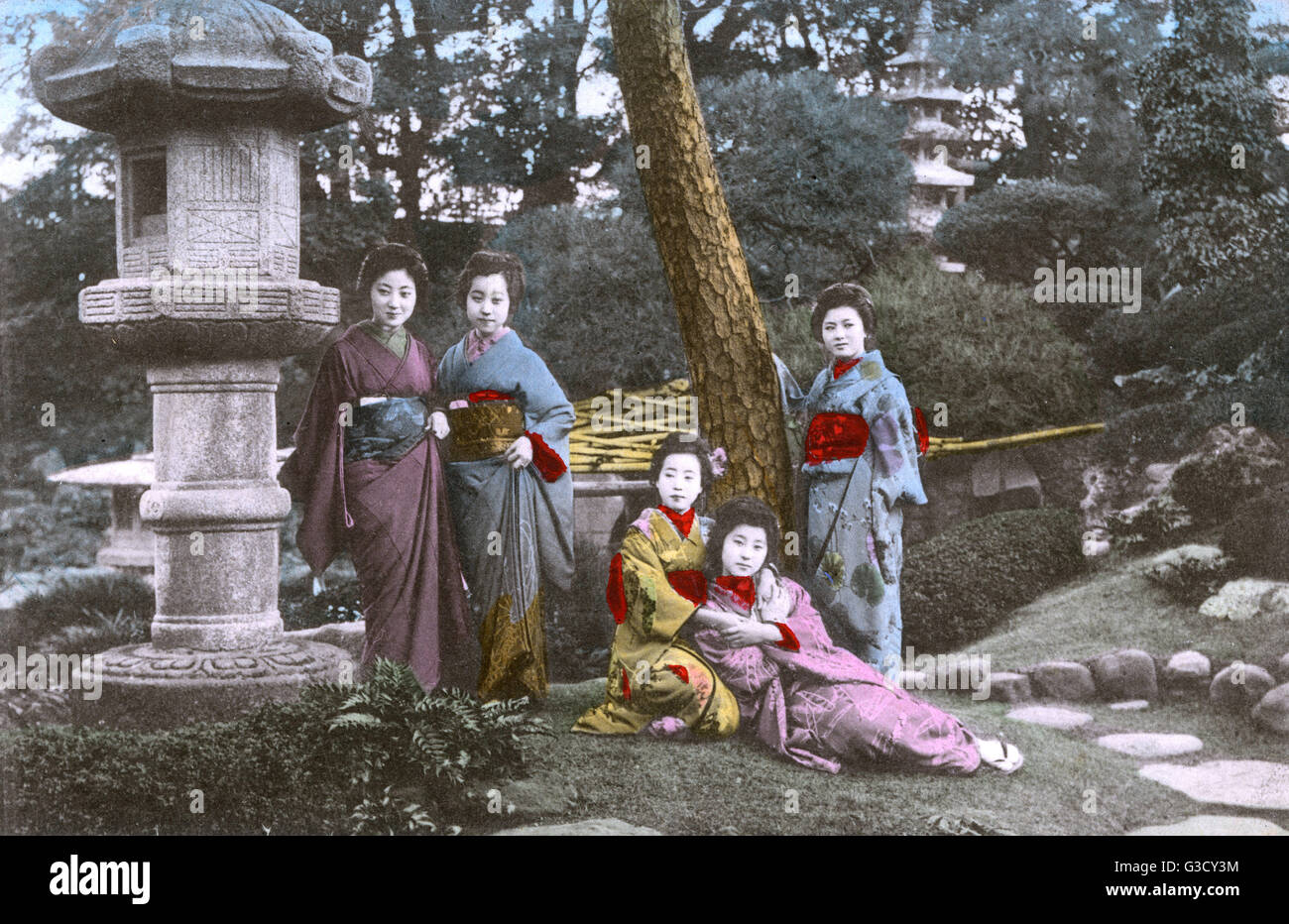 Japan - Five Geisha pose for the photographer in a garden Stock Photo ...
