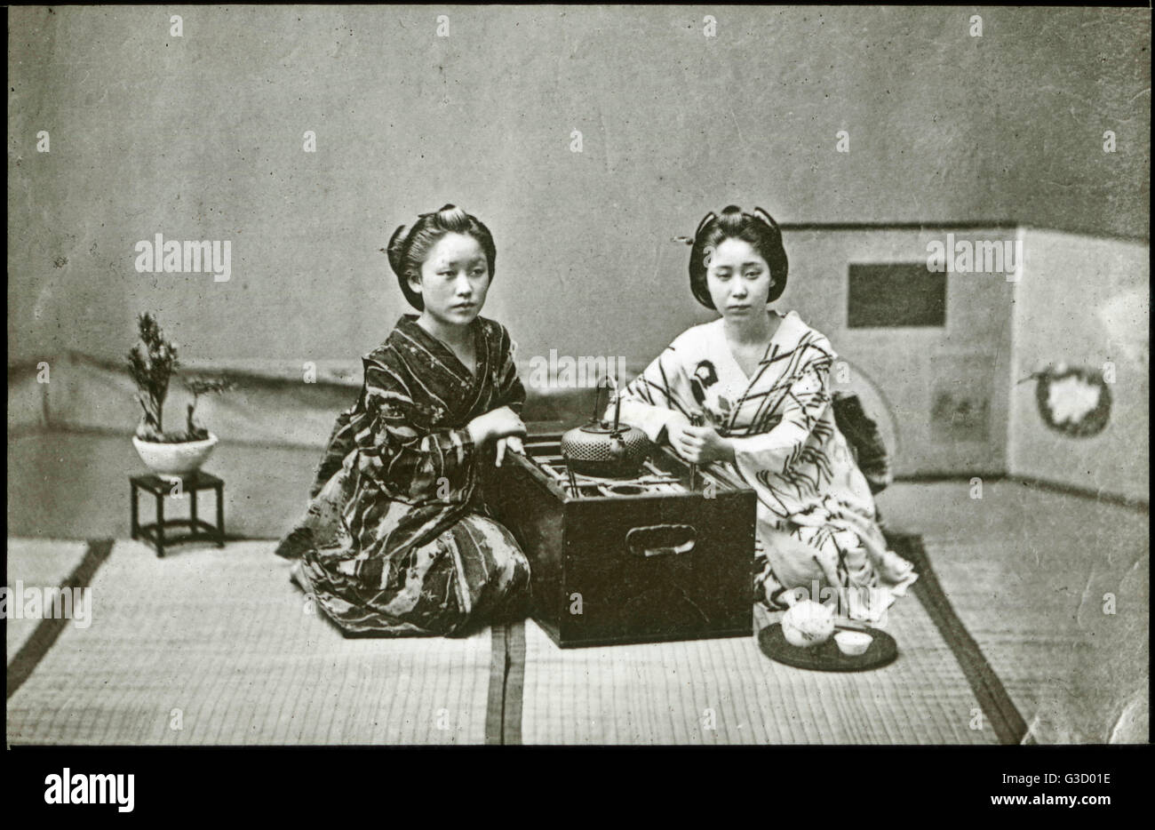 Two Japanese women drinking tea Stock Photo - Alamy
