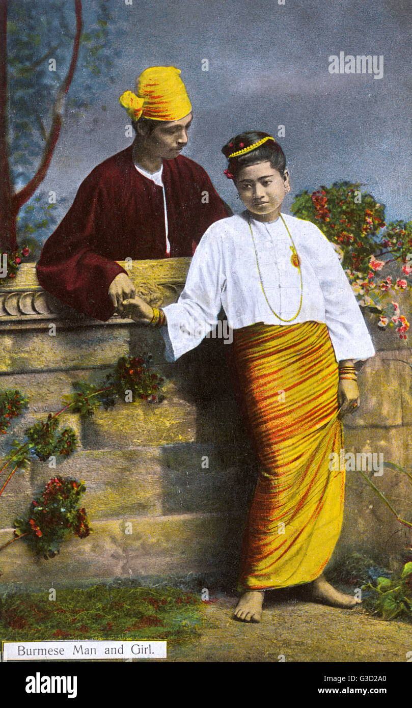 Myanmar - Couple holding hands over a low wall Stock Photo - Alamy