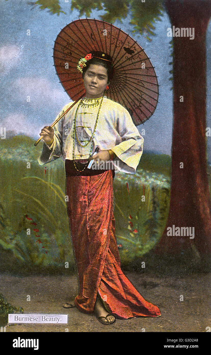 Burmese Beauty - Studio portrait with parasol and cigar Stock Photo - Alamy