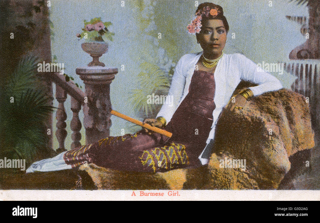 Myanmar - A Burmese girl reclining on a studio divan Stock Photo - Alamy