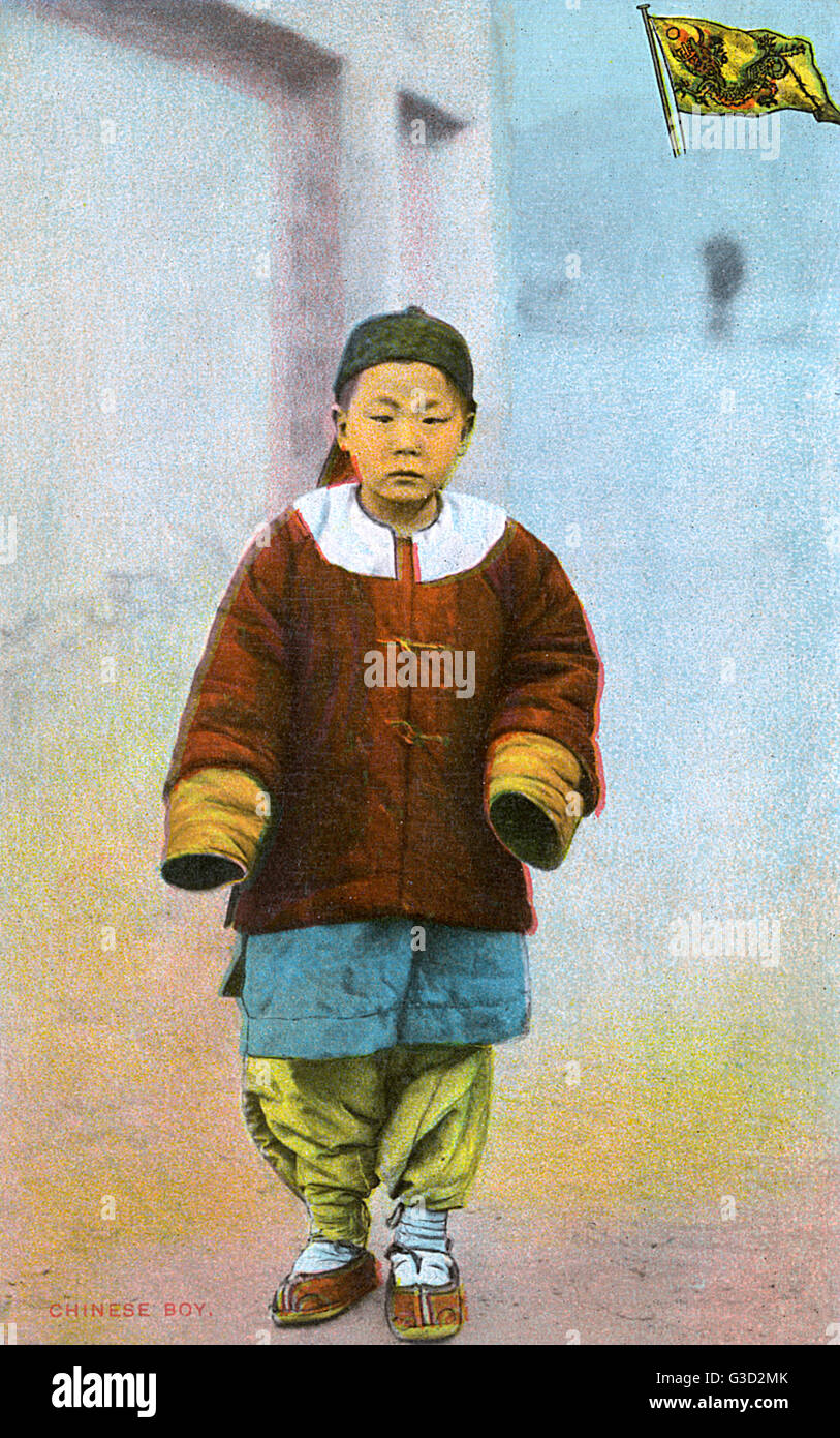 Young Chinese boy in traditional costume Stock Photo - Alamy